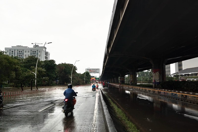 Banjir di Jakarta Surut, Tersisa 4 Ruas Jalan dan 1 RT - Bagian All